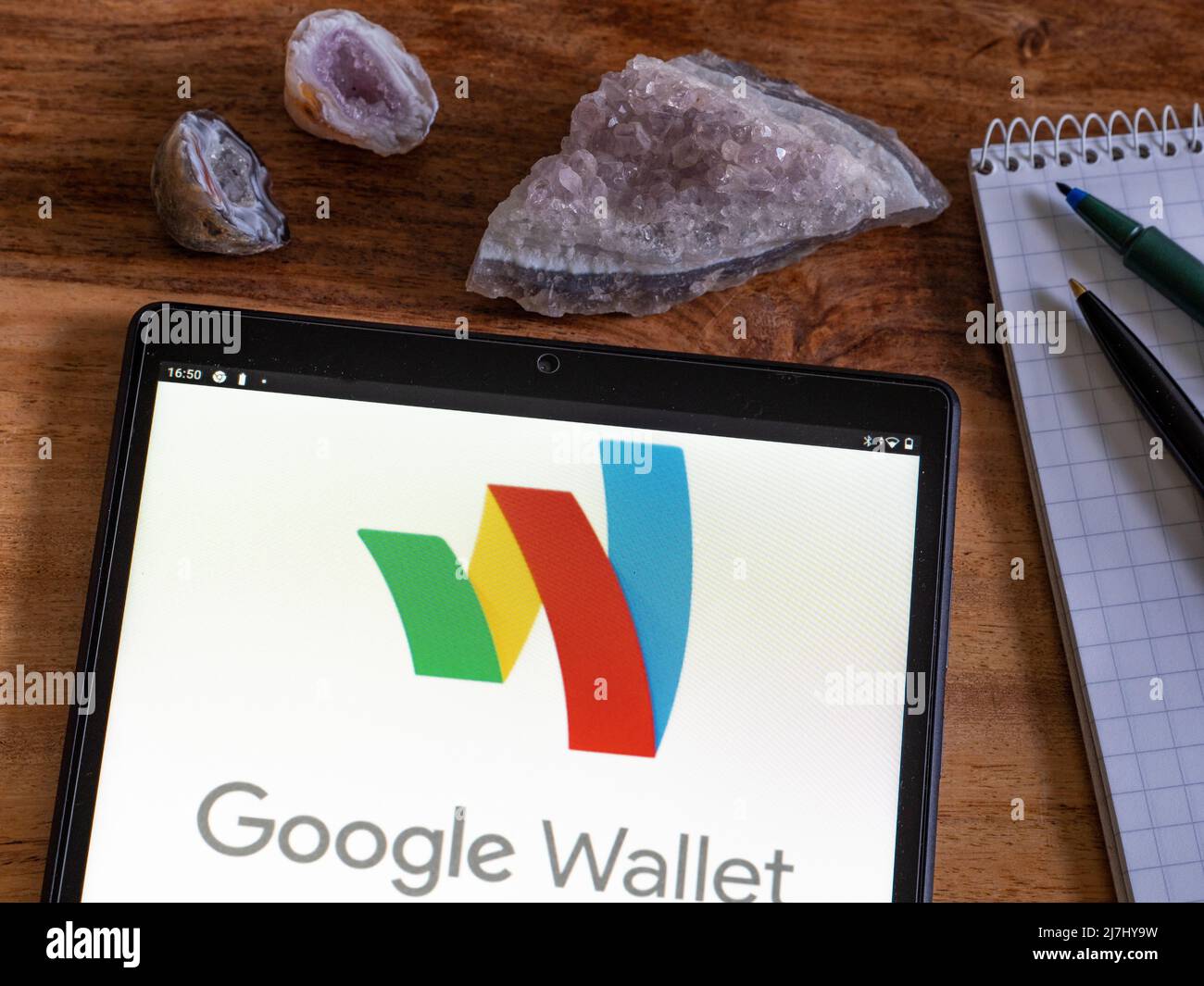 In this photo illustration Google Wallet logo seen displayed on a ...