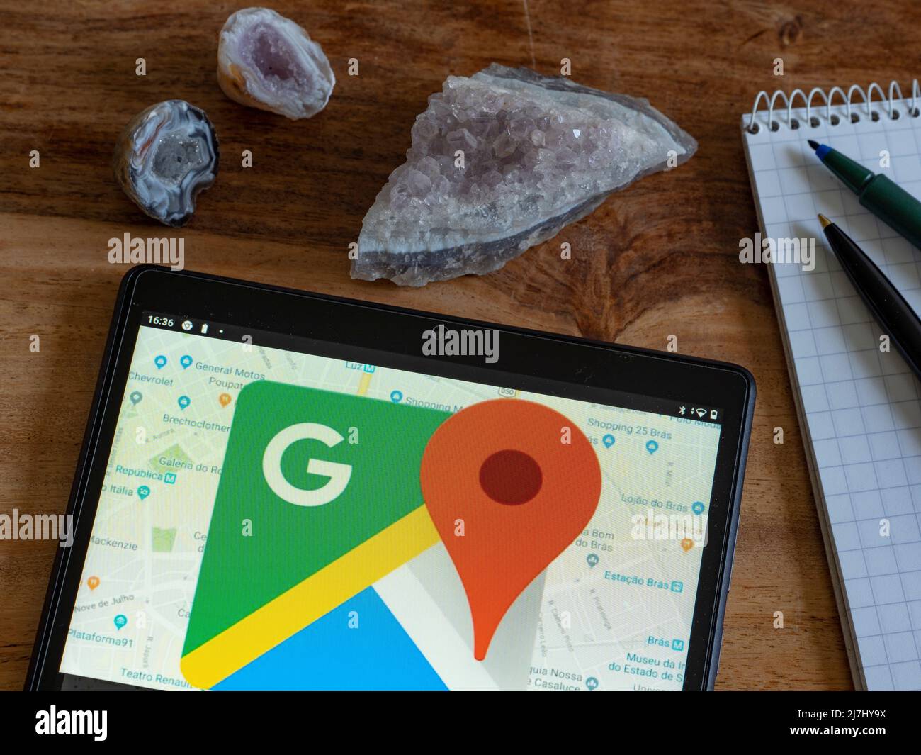 In this photo illustration Google Maps logo seen displayed on a tablet ...