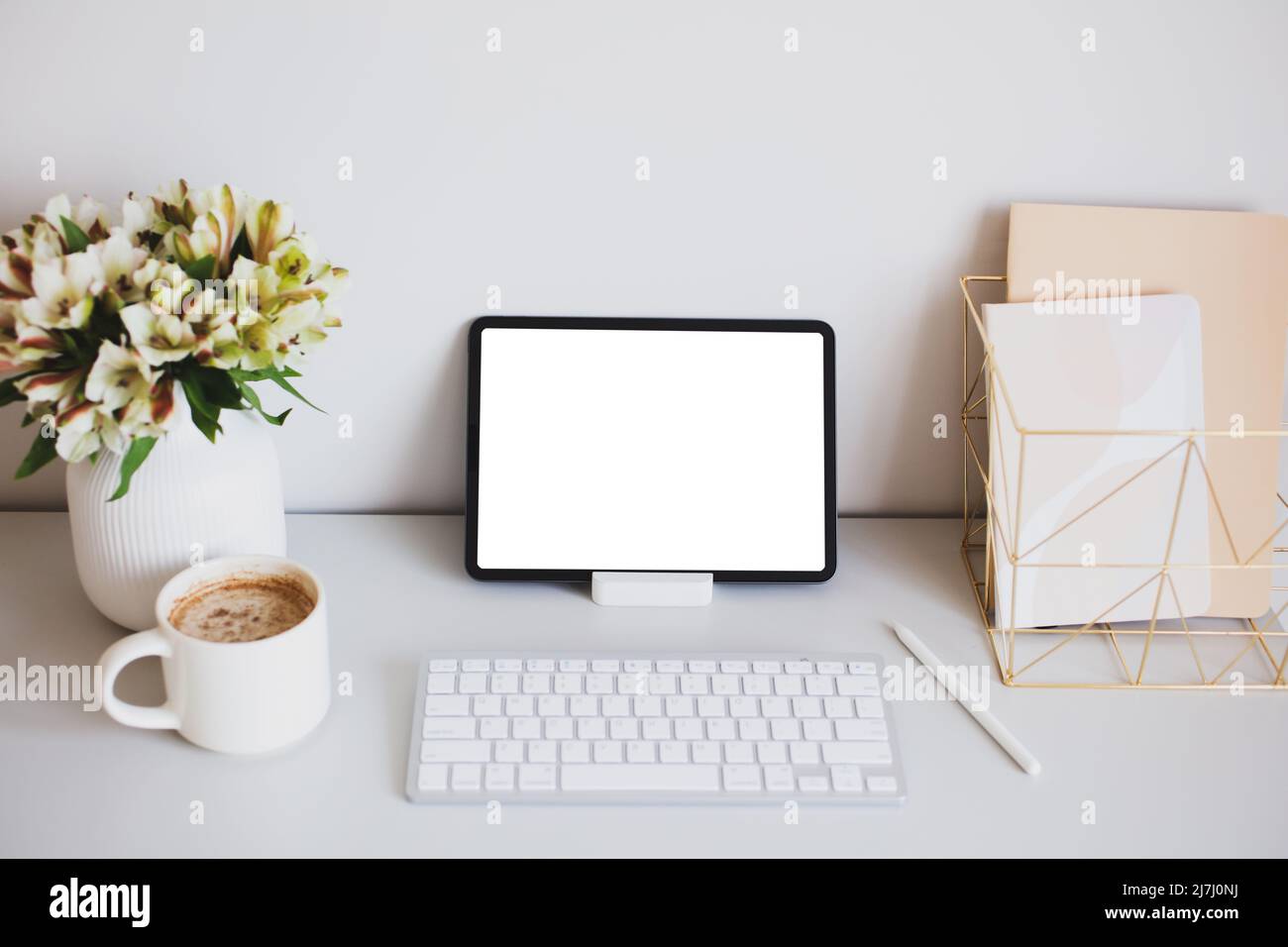 Digital tablet mockup with pen, keyboard, cup of coffee, paper ...