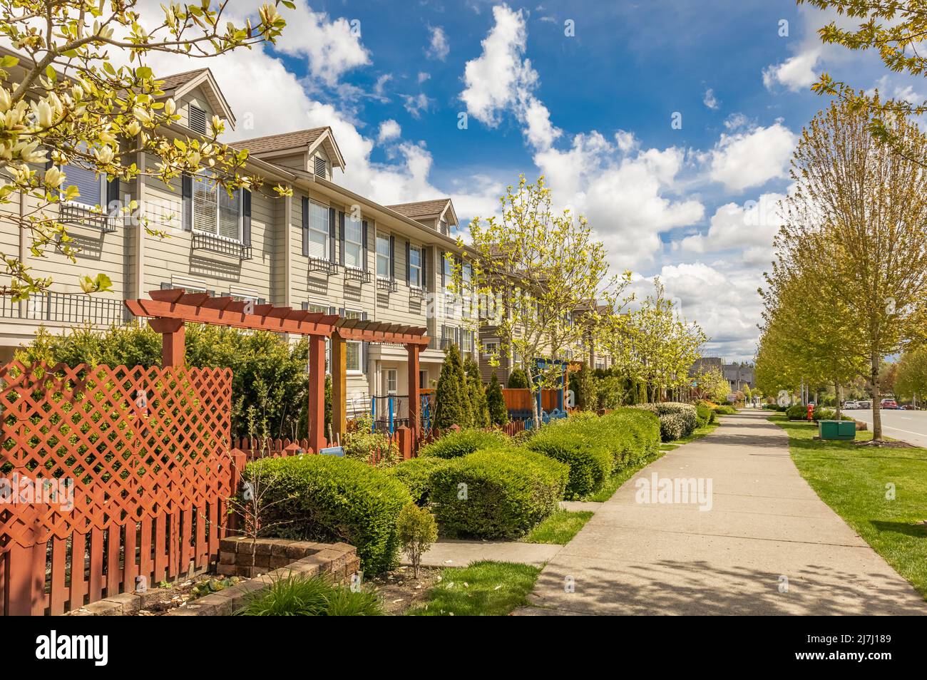 Neighborhood modern houses with spring flowers in BC, Canada. Canadian ...