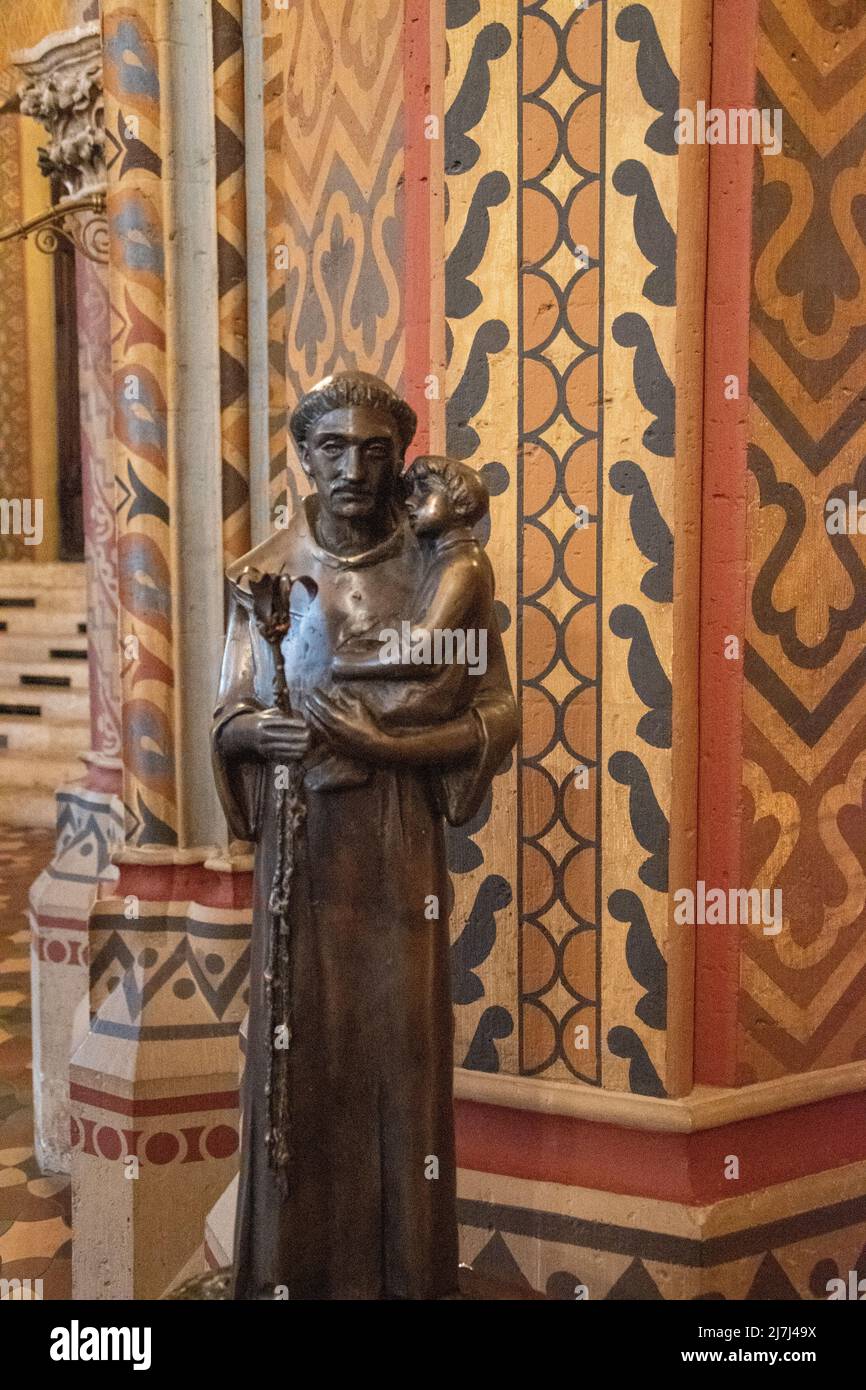 Monk with child statue. The Church of the Assumption of the Buda Castle ...