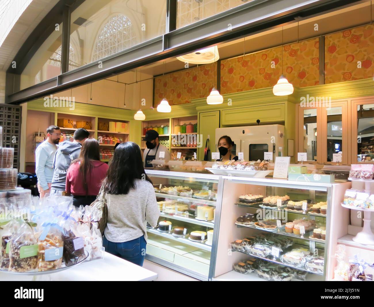 Customers in Line to Purchase Candy and Desserts at Confectionary Store ...