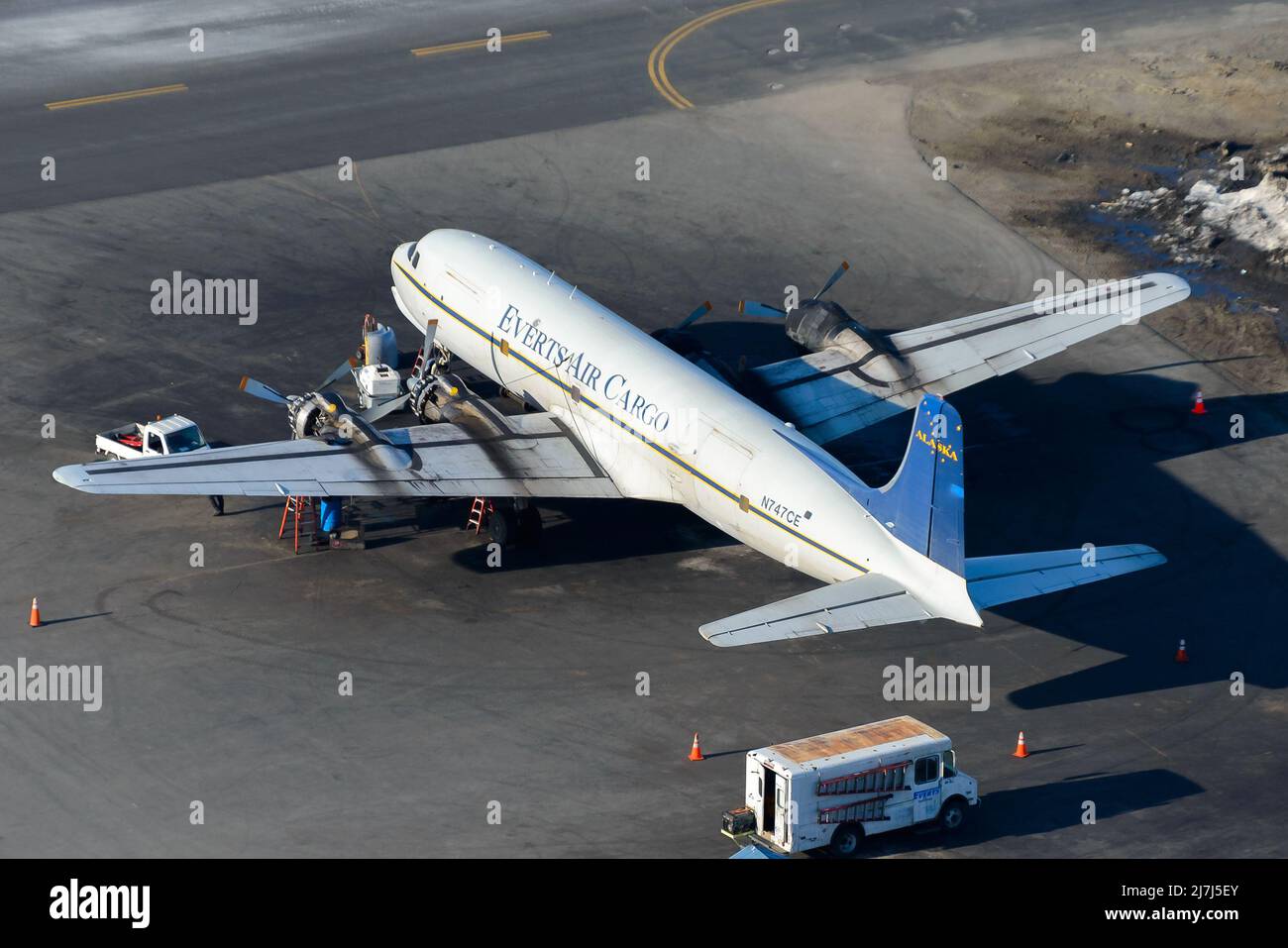 Everts Air Cargo C-188A Liftmaster aircraft. Plane DC-6 (DC-6A version ...