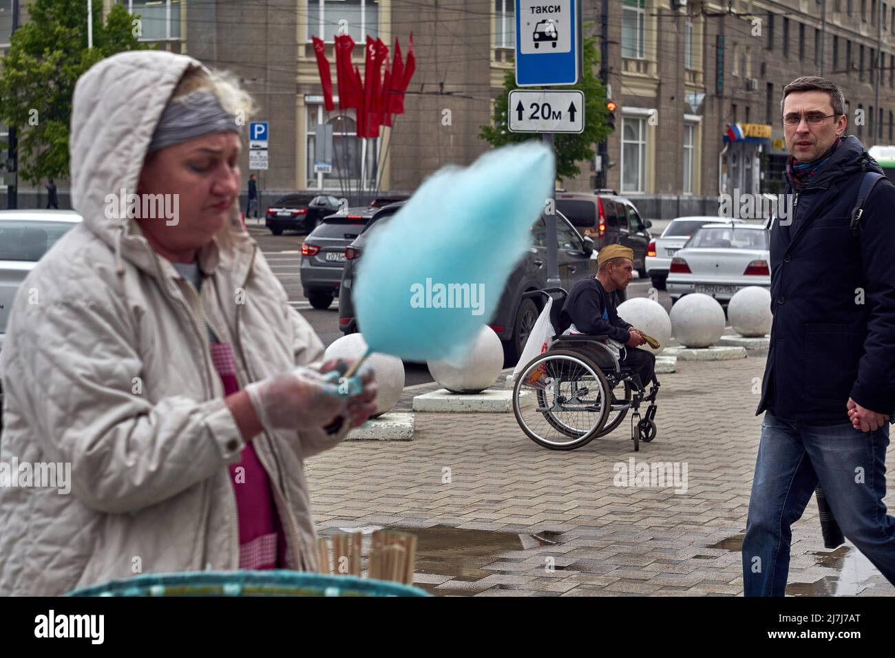 A cotton candy vendor sells candy on the 77th anniversary of the ...