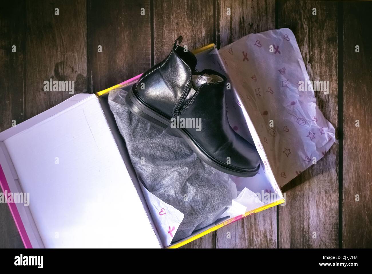 ONLINE PURCHASES. PLATFORMS. LEATHER BOOT BOX. HORIZONTAL Stock Photo ...