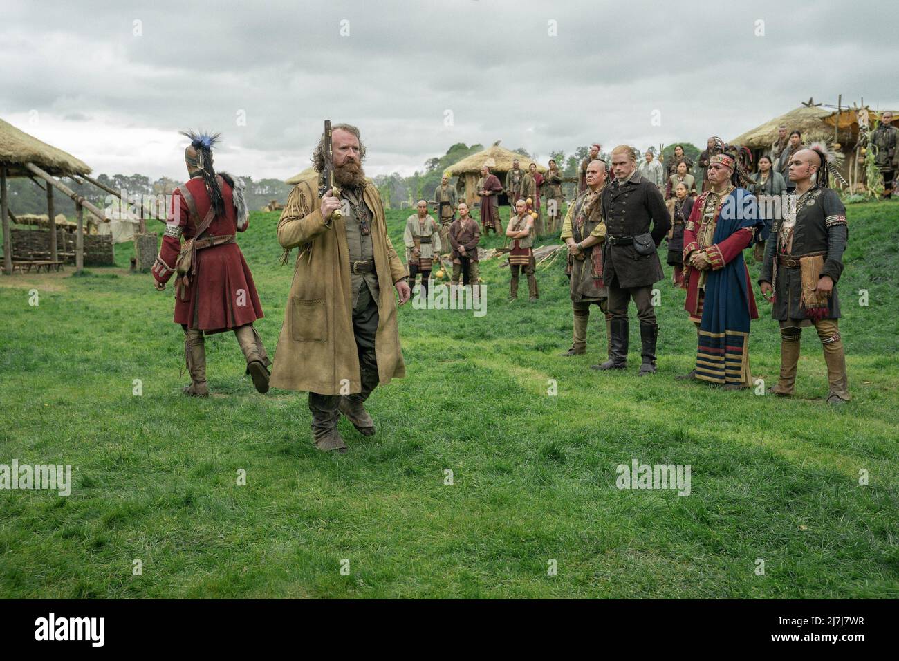 OUTLANDER, at left, holding pistol: Mike Geary; right: Marty Wildman ...