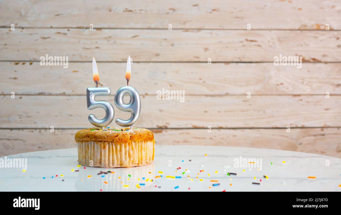 Happy birthday silver digits on white boards background copy space ...
