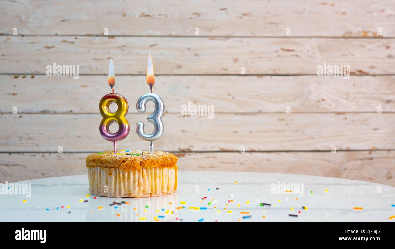 Happy birthday silver digits on white boards background copy space ...