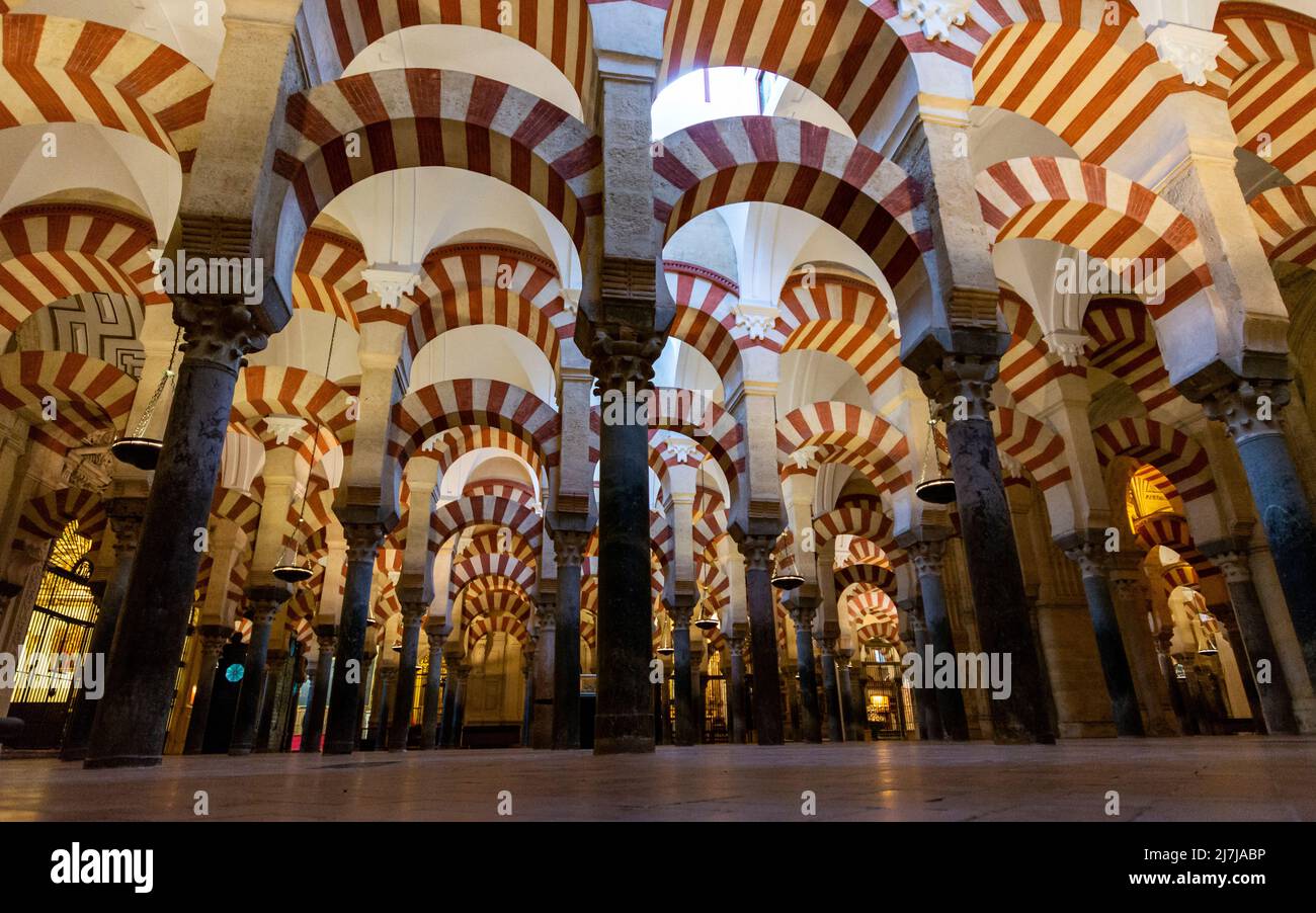 Medieval moorish architecture, colorful achways with columns in old ...