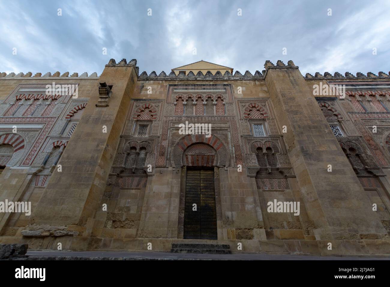 Medieval walls with ornament of old mosque in town Cordoba, Andalusia ...