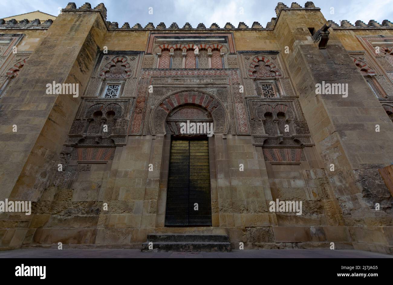 Medieval walls with ornament of old mosque in town Cordoba, Andalusia ...