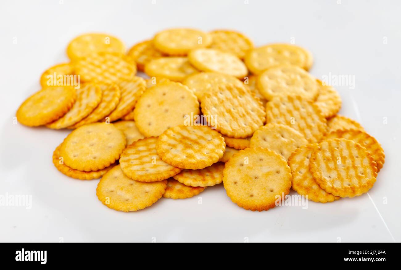Bunch of cracker biscuits over white background Stock Photo - Alamy