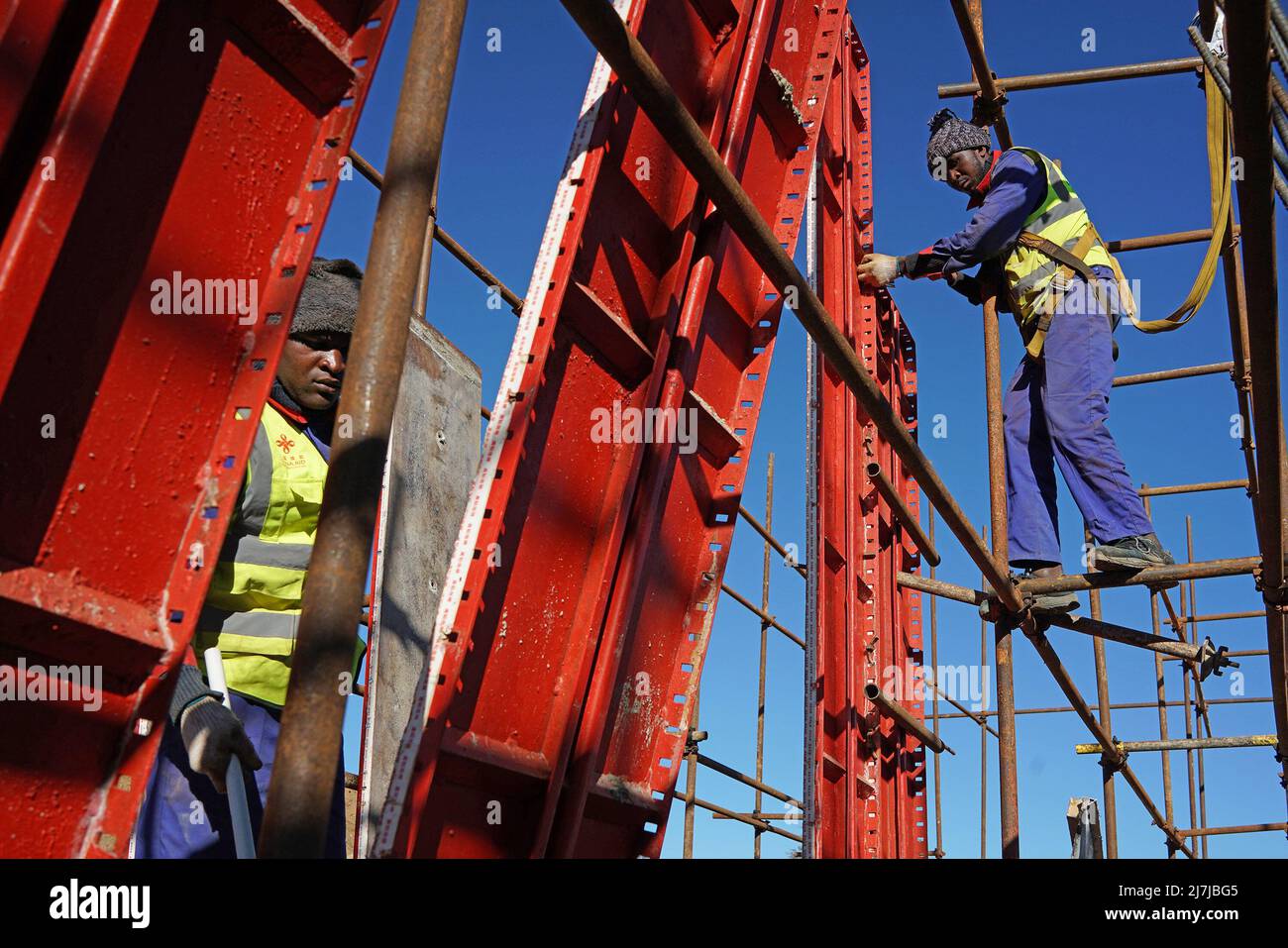 Windhoek, Namibia. 9th May, 2022. People work at the construction site ...