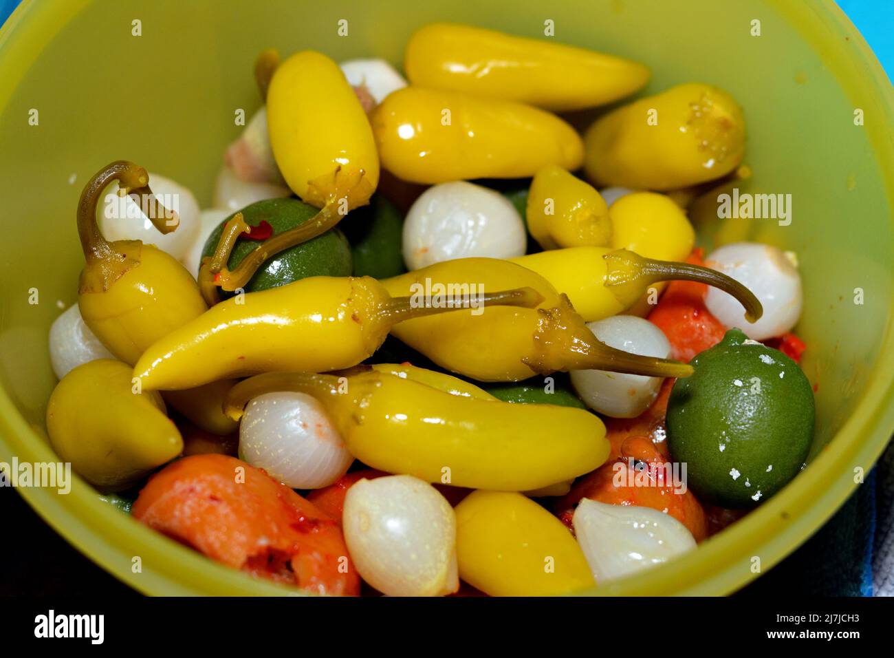 Egyptian pickles inside a deep plastic bowl, marinated preserved ...