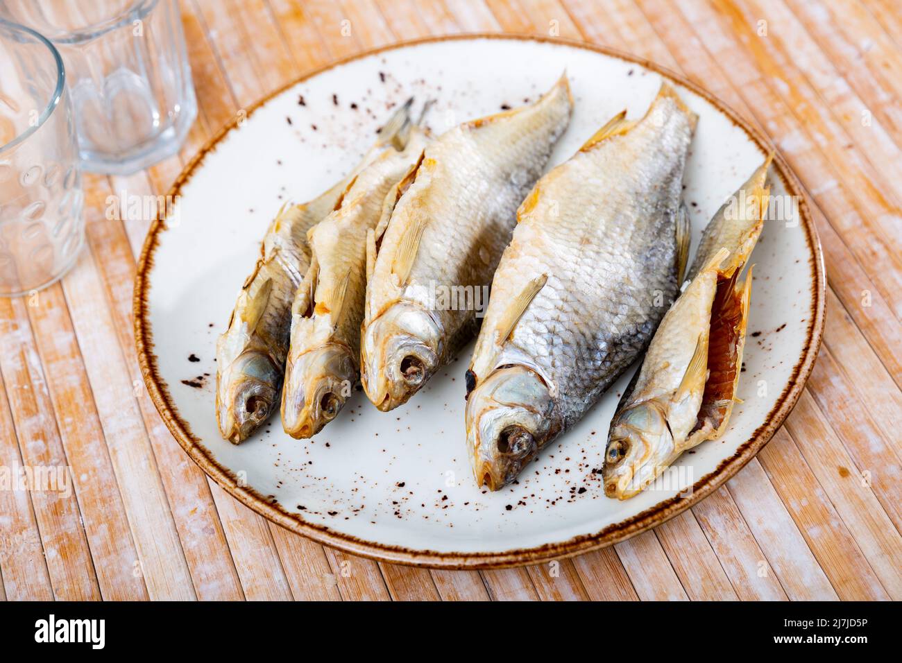 Air-dried salted gutted fish roach Stock Photo - Alamy