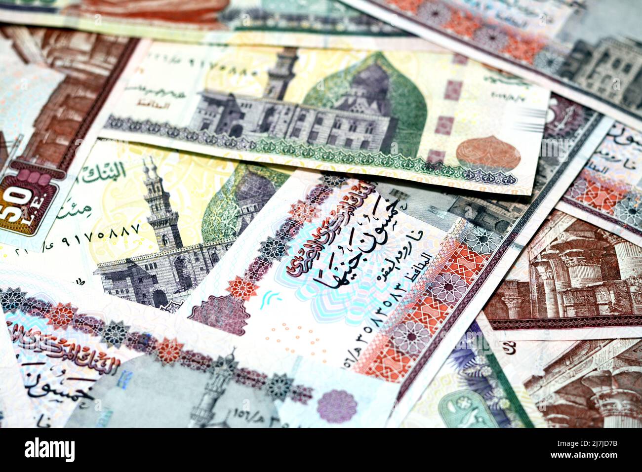 Background of a pile of Egyptian money banknotes of 50 LE and 200 LE ...