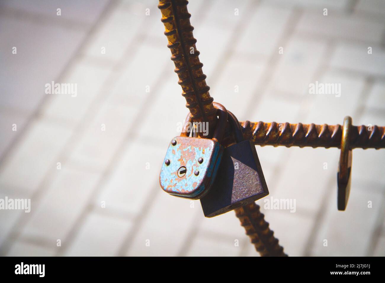 Old padlock. Door lock in the form of a heart. Closed door. The ...