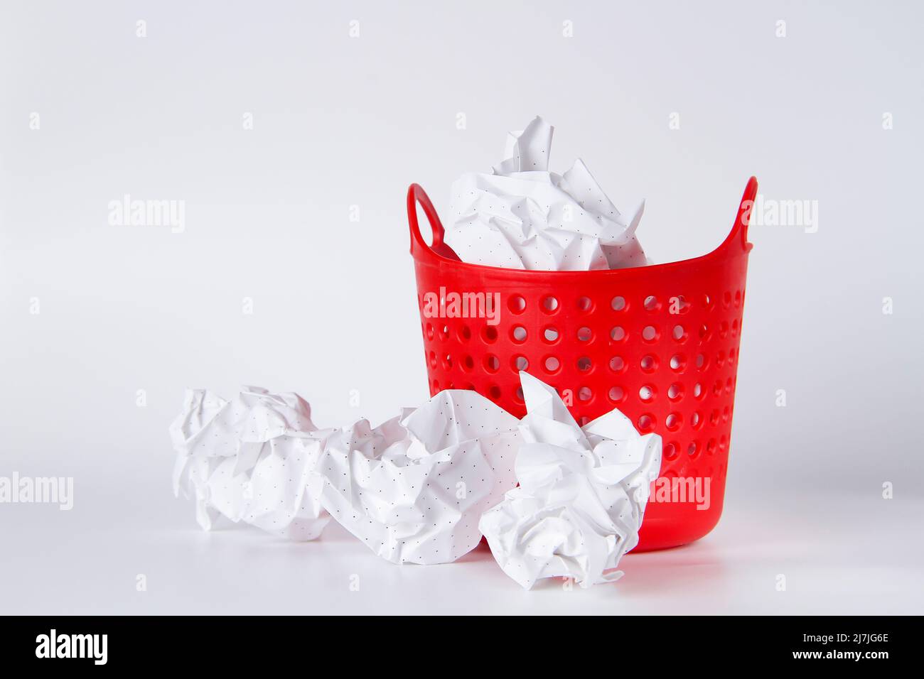 Trash can. Full basket. Crumpled paper in a basket. A mountain of ...