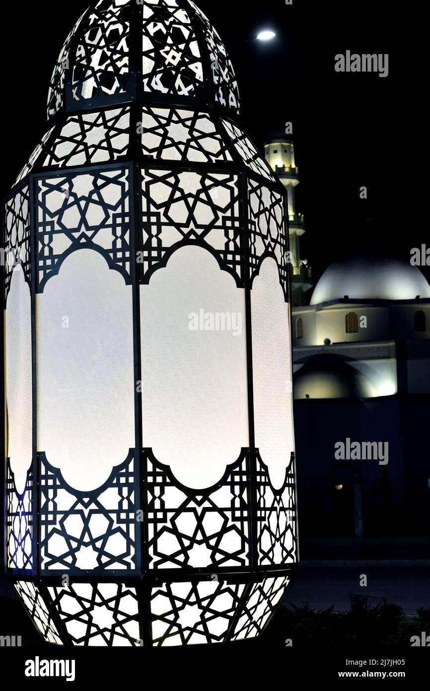 A large Islamic Ramadan lantern made steel and glass in the street as a ...