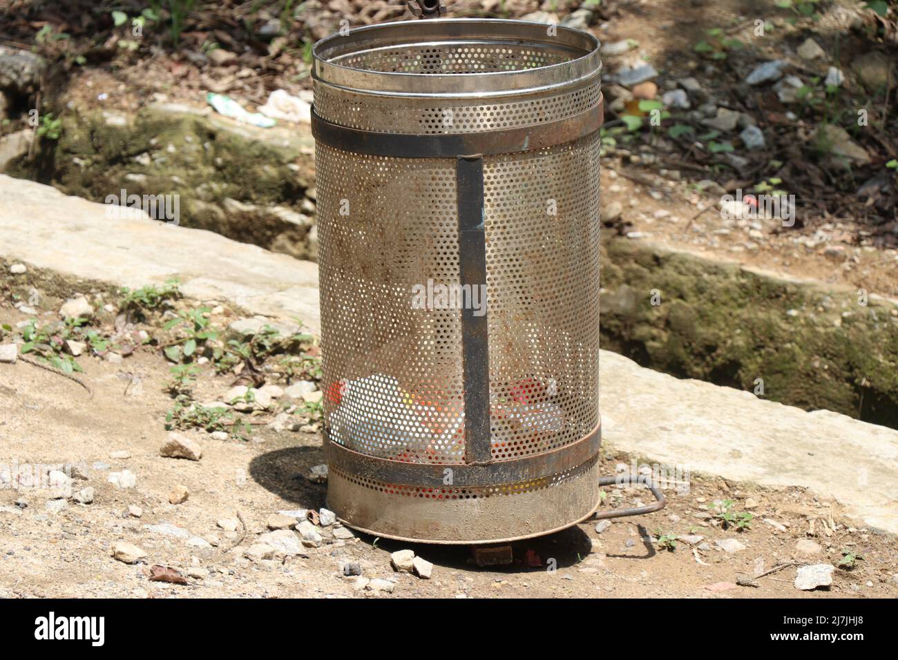 Silver trash can outside hi-res stock photography and images - Alamy