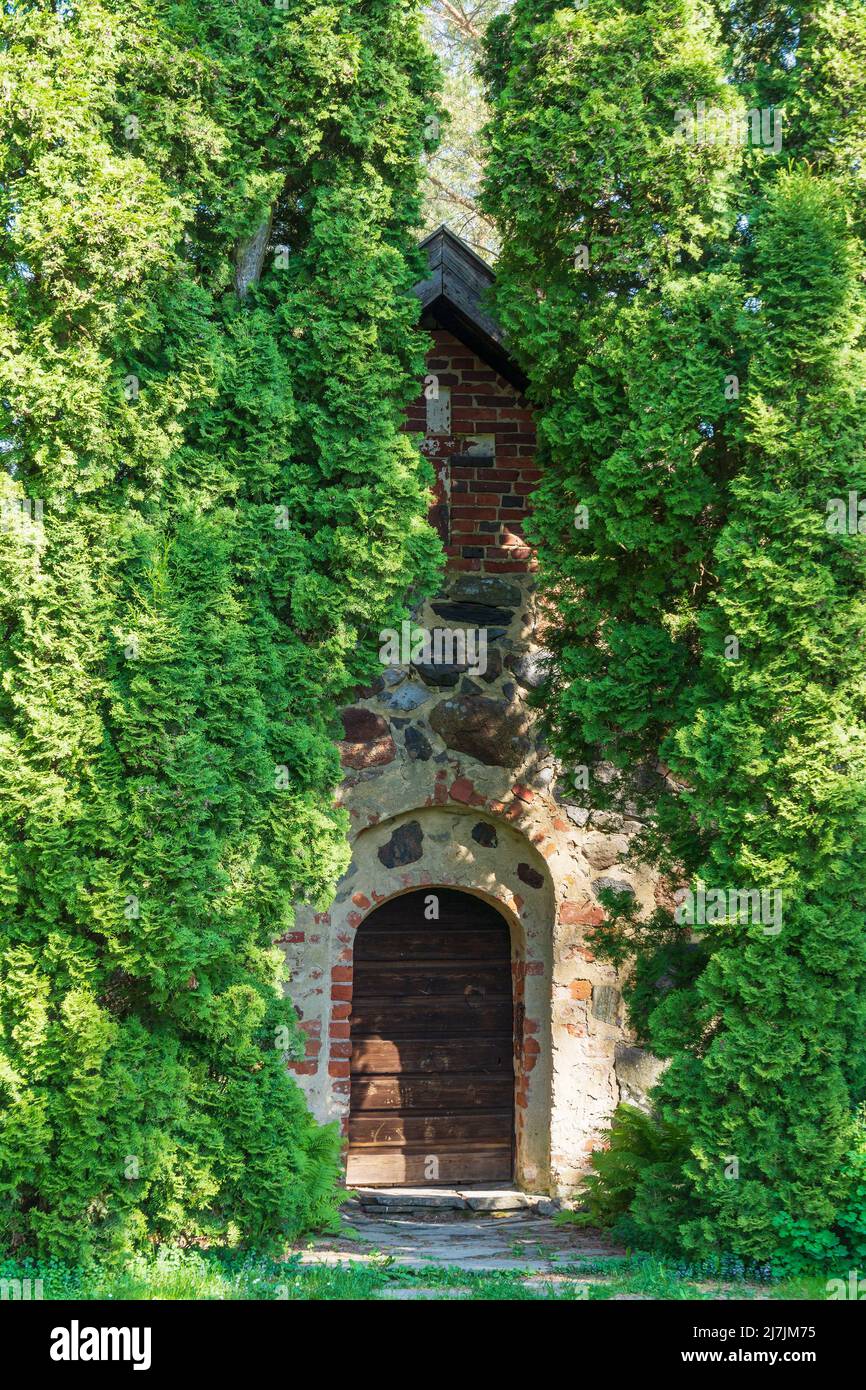 Old stone church between the tree branches in Lepaa Finland Stock Photo ...