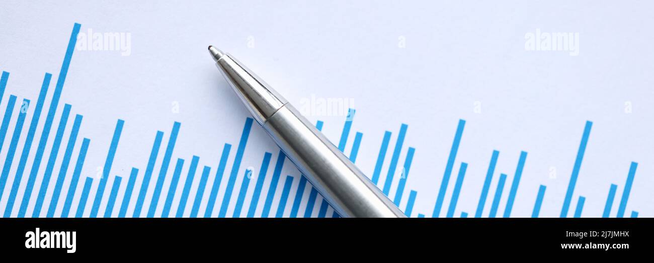 Ballpoint pen lying on document with graph closeup Stock Photo - Alamy