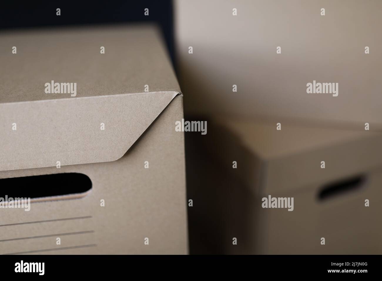 Empty solid cardboard boxes with covers, beige containers to storage ...