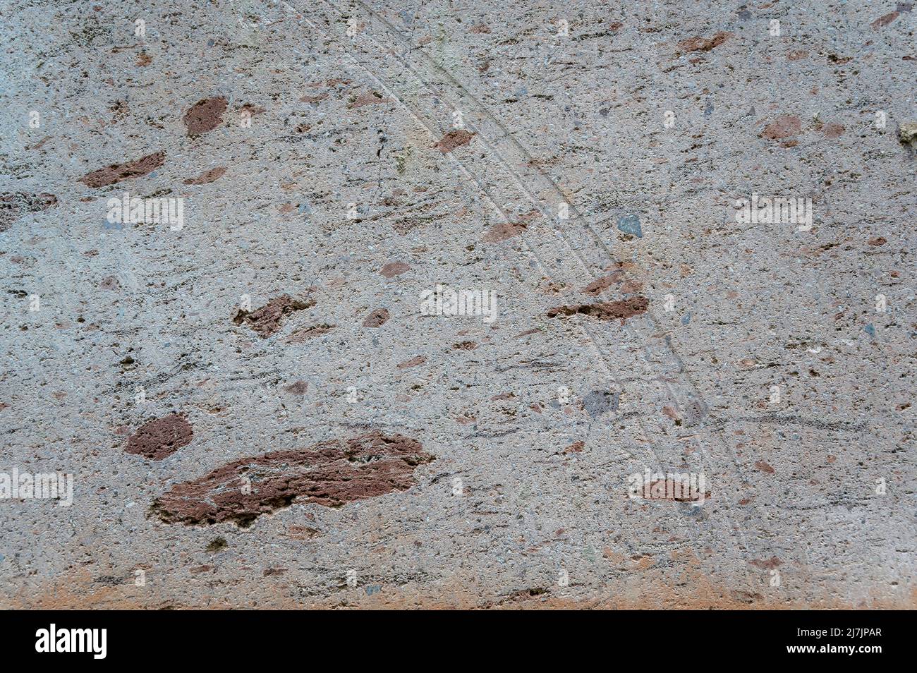 Stone texture. Detailed shot of sawn stone. Circular saw marks on the ...