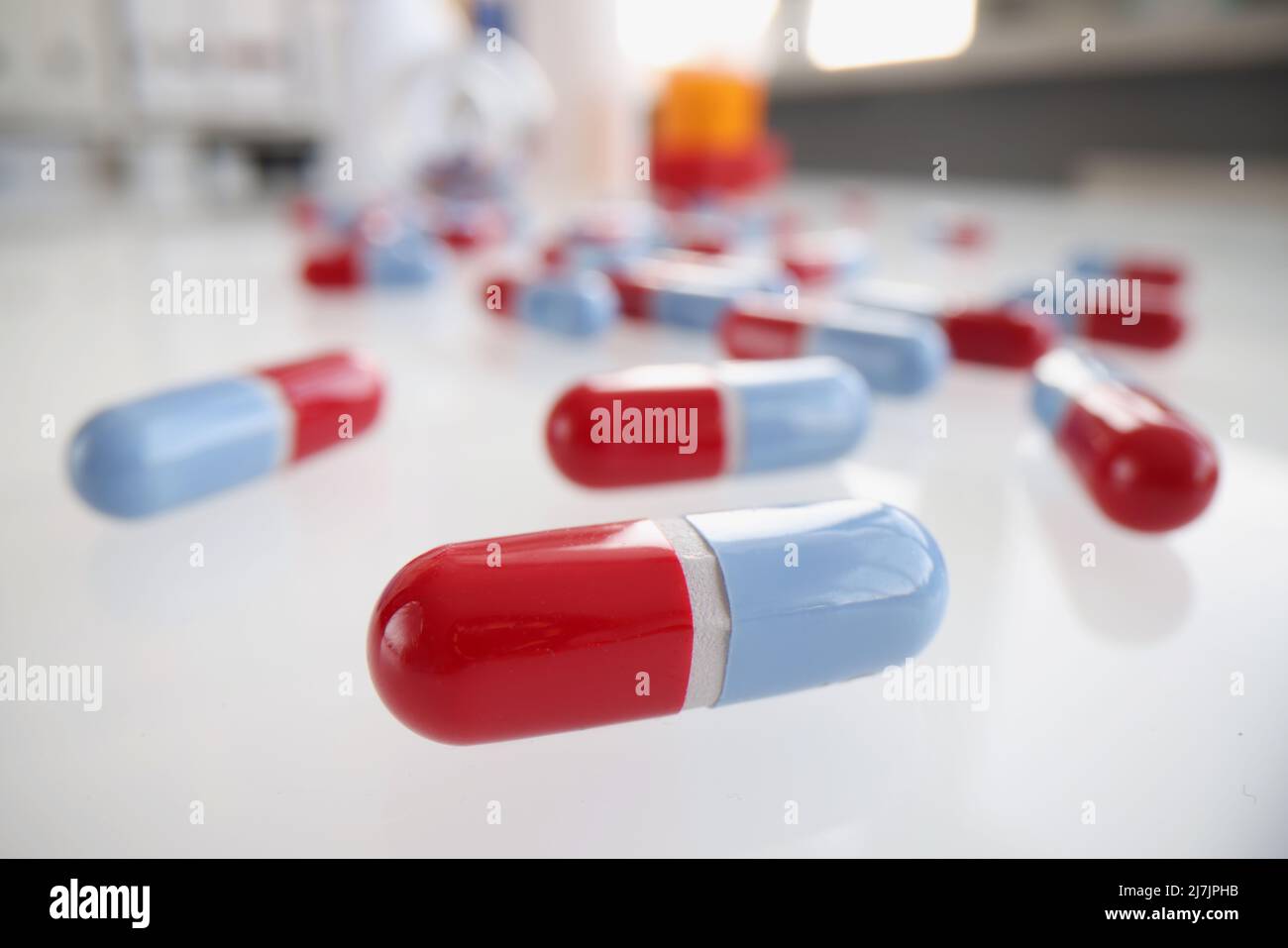 Bunch of colourful medications on tablet, pills and capsules on surface ...