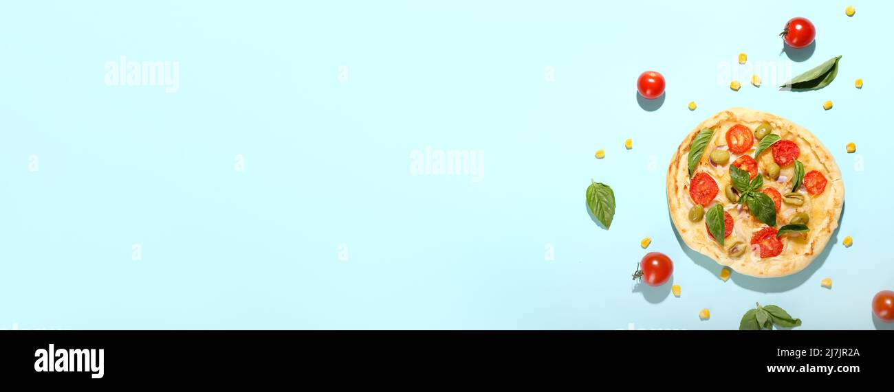 Delicious mini pizza on light blue background with space for text Stock ...