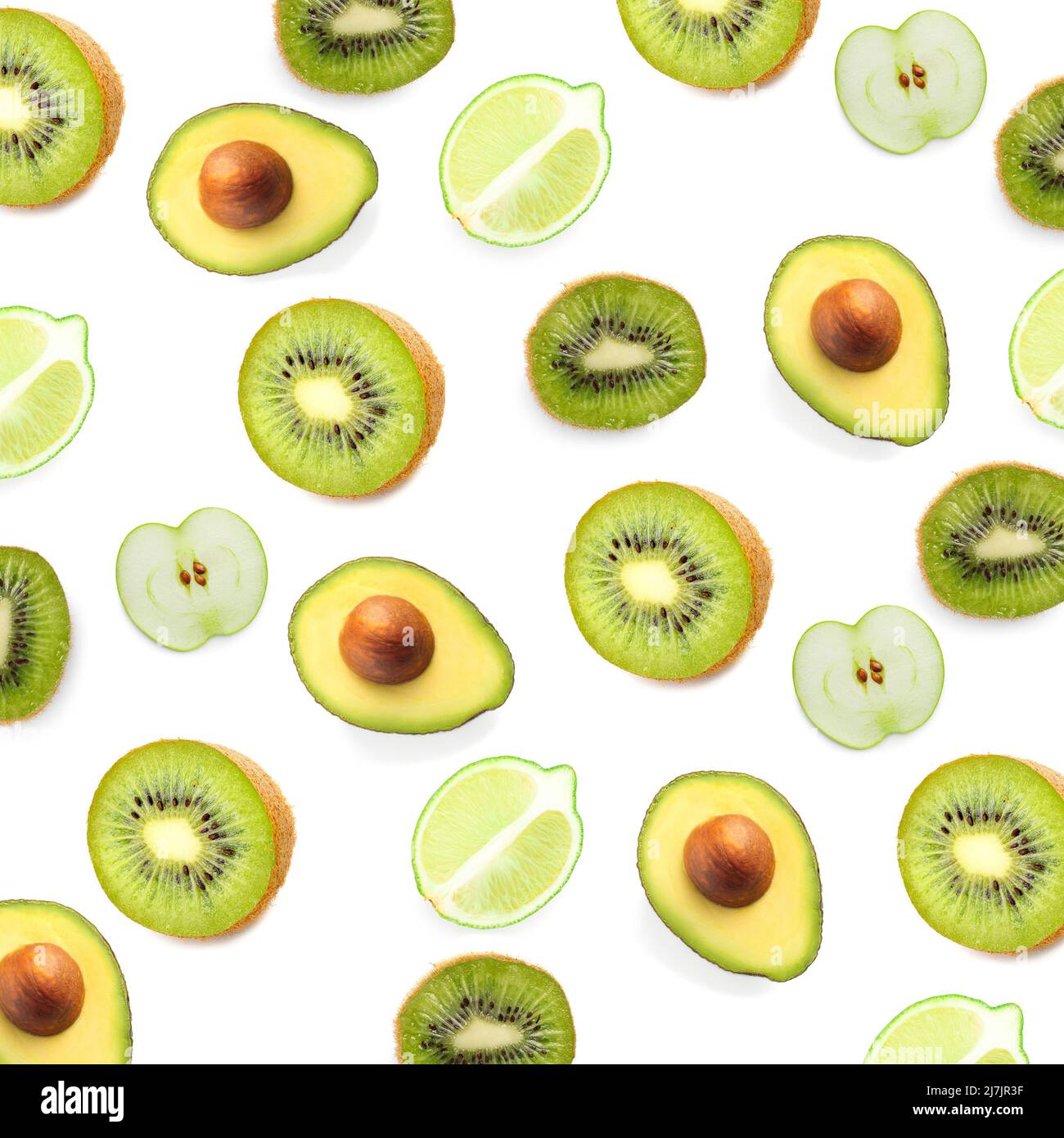 Set of cut green fruits on white background Stock Photo - Alamy