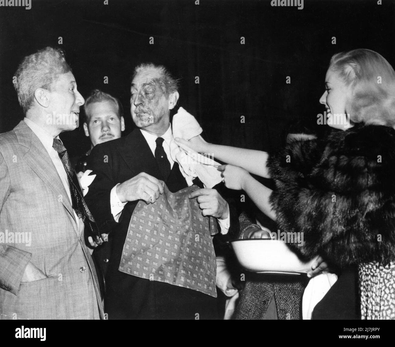 SID GRAUMAN JOHN BARRYMORE and MARY BETH HUGHES on the forecourt of ...