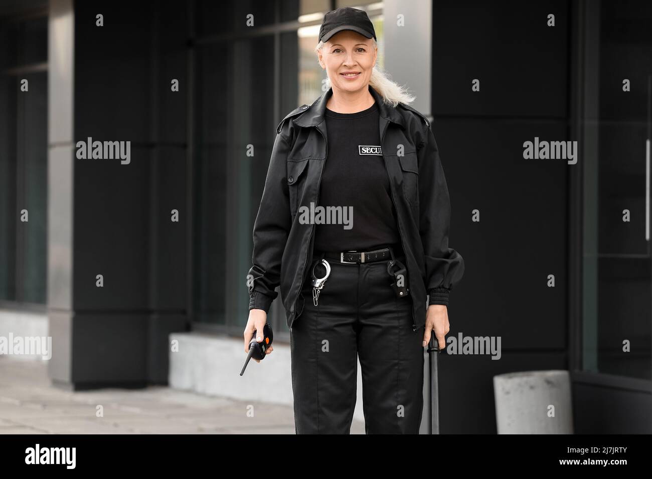 Female security guard outdoors Stock Photo - Alamy