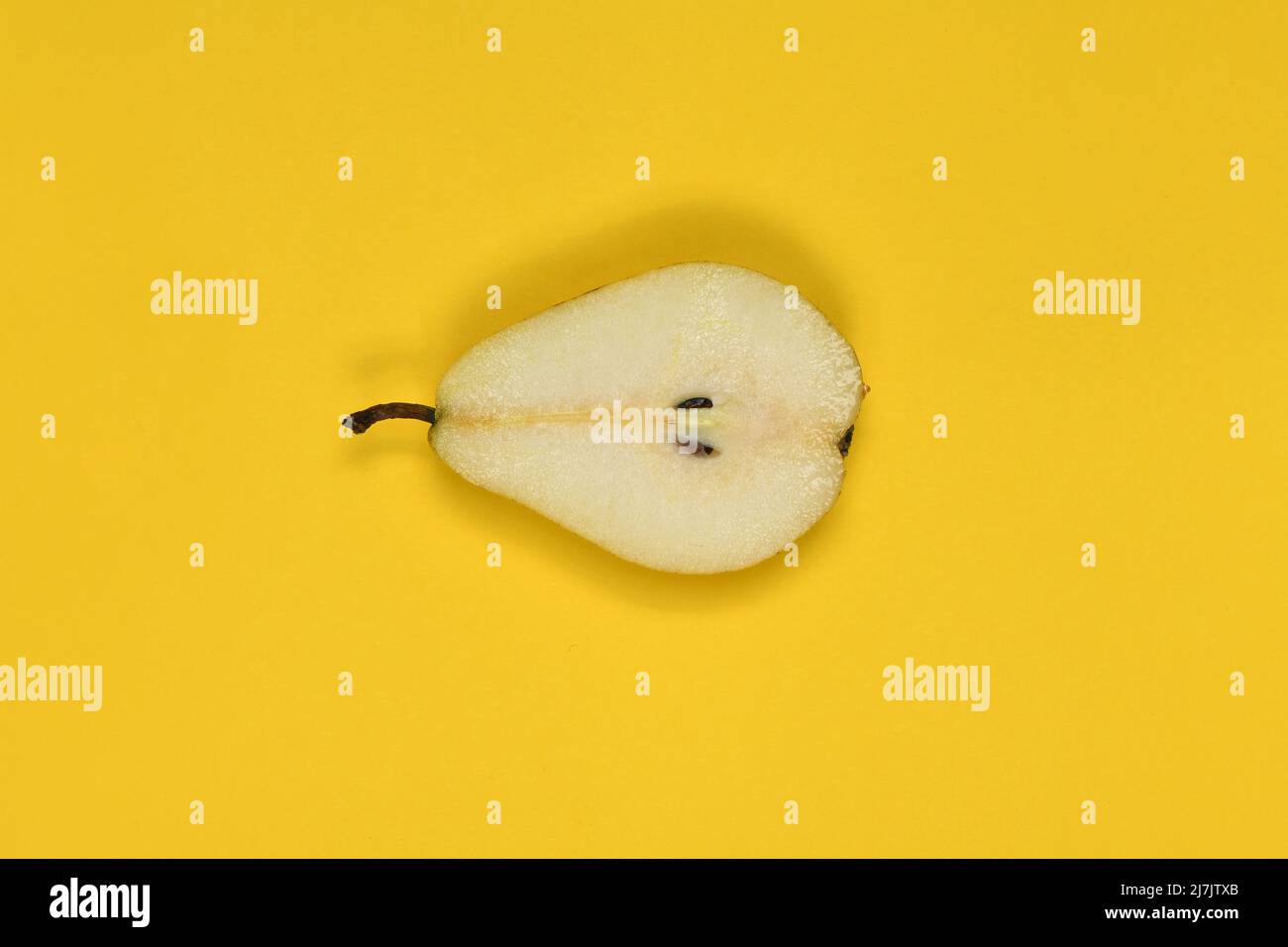 Pears isolated on yellow background. Pears macro studio photo. High ...