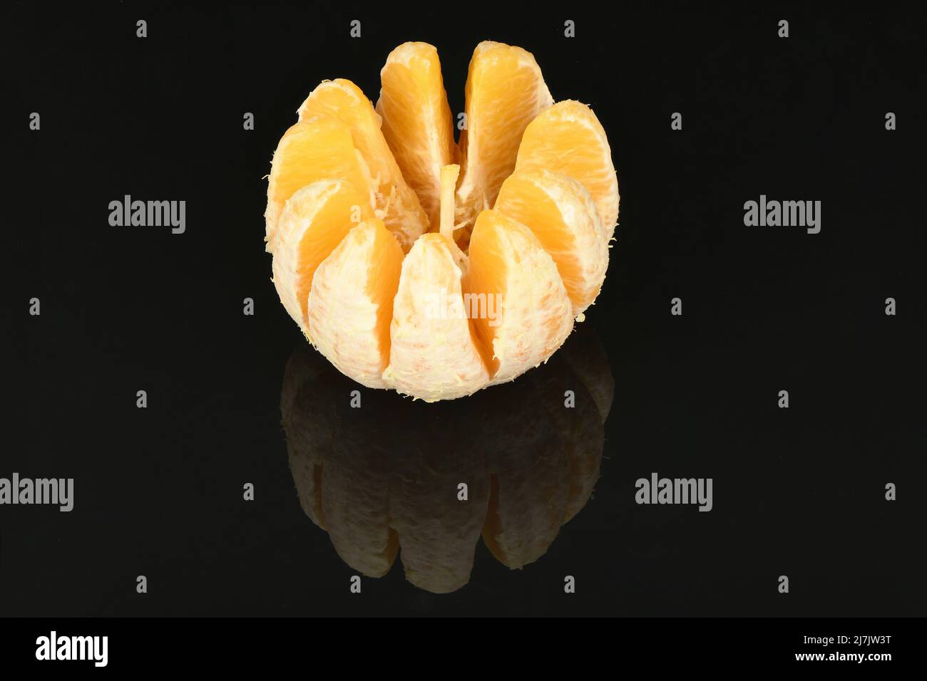Perfectly retouched orange isolated on acrylic black background. High ...
