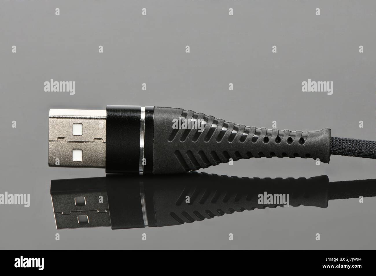 Closeup of an USB connector on black acrylic background. High ...