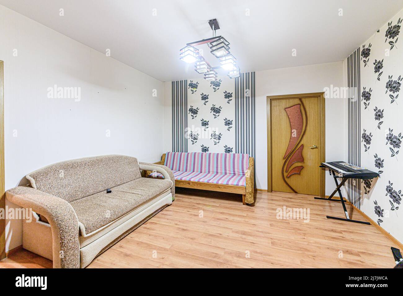 Russia, Moscow- May 21, 2020: interior apartment living room with sofa ...