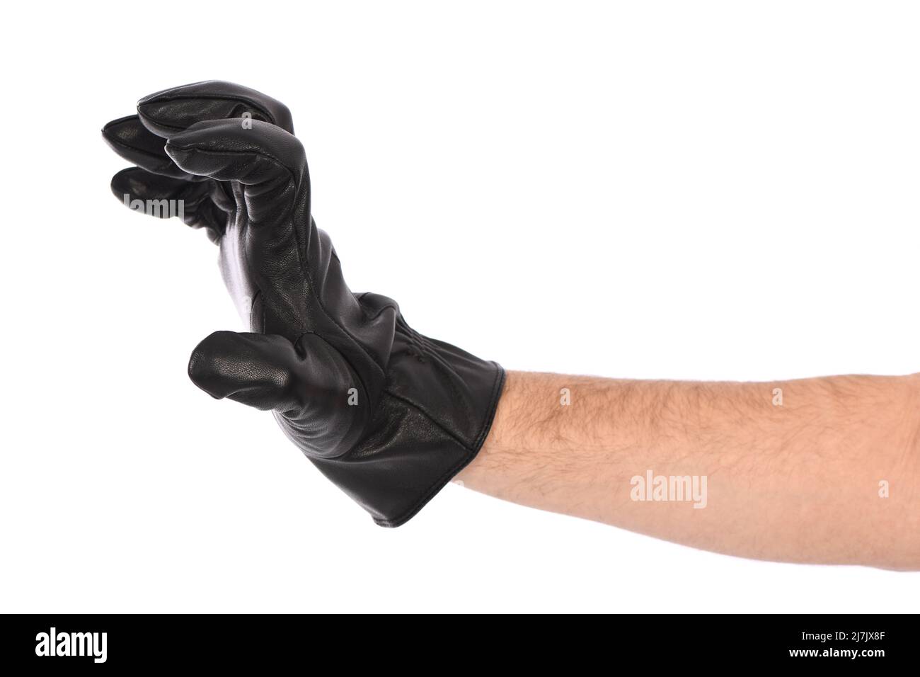 Man wearing black leather glove on white background, closeup. Side view ...