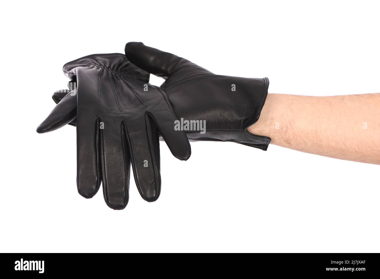 Man wearing black leather glove on white background, closeup. Side view ...