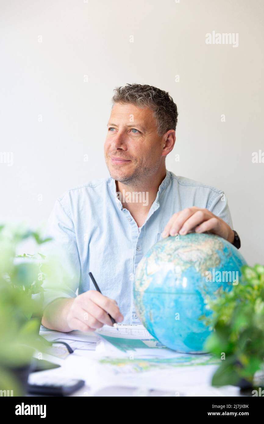 Business portrait of environmental engineer, ecologist, garden ...
