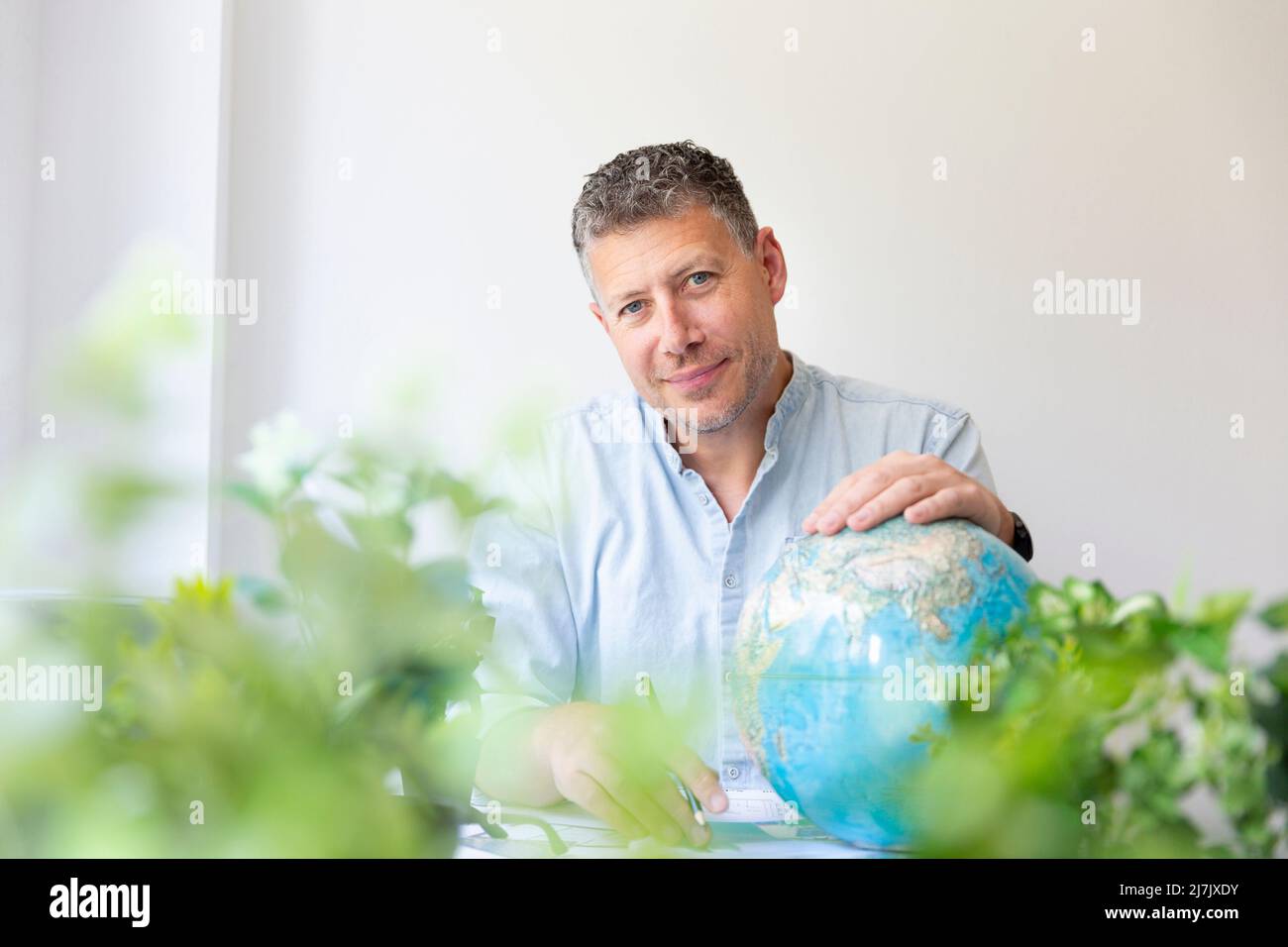 Business portrait of environmental engineer, ecologist, garden ...