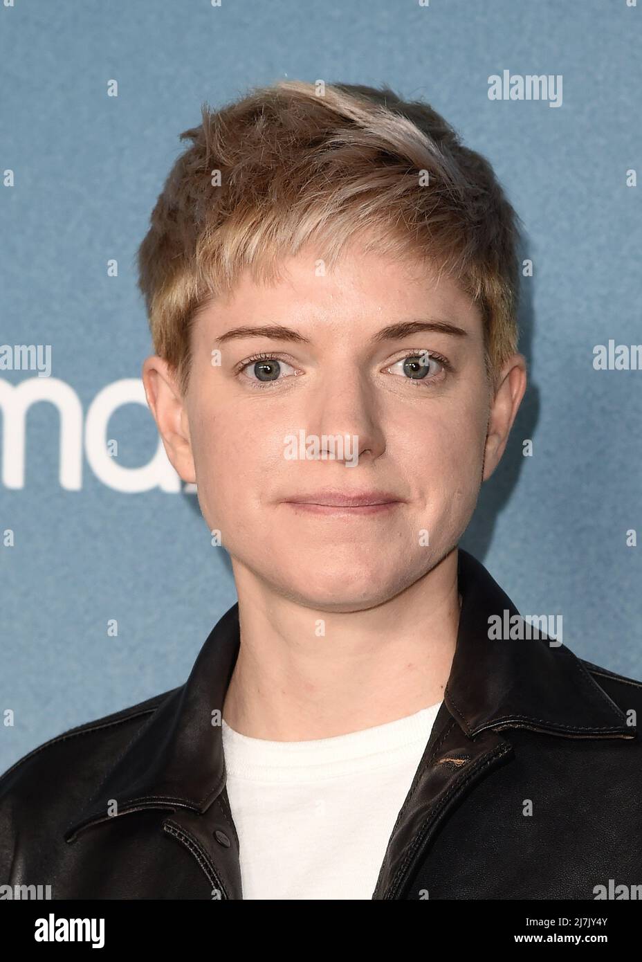 Mae Martin walking on the red carpet at the HBO Max "Hacks" Season 2 ...