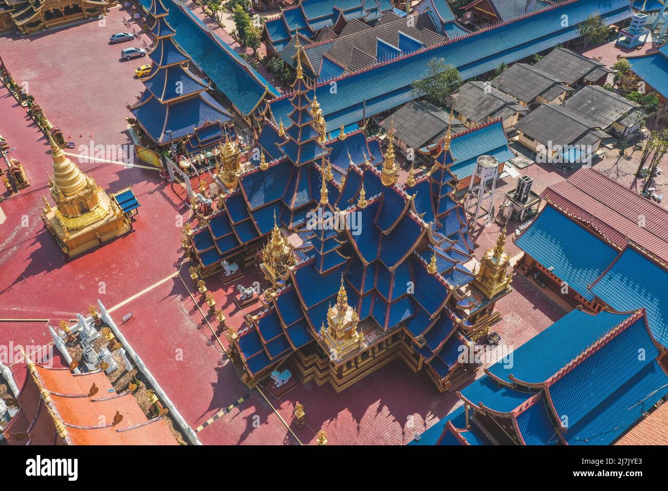 Aerial view of Wat Phiphat Mongkhon blue temple in Sukhothai, Thailand ...