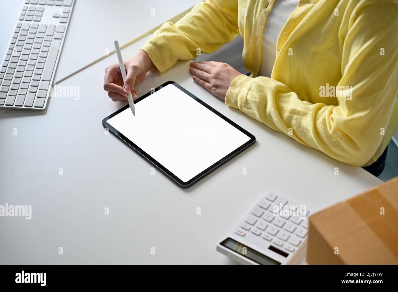 Cropped, Top view, Female or businesswoman using stylus pen drawing on ...