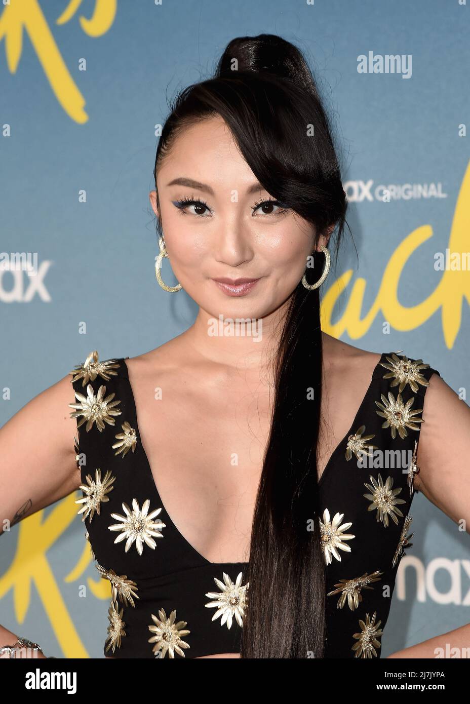 Poppy Liu walking on the red carpet at the HBO Max "Hacks" Season 2 ...