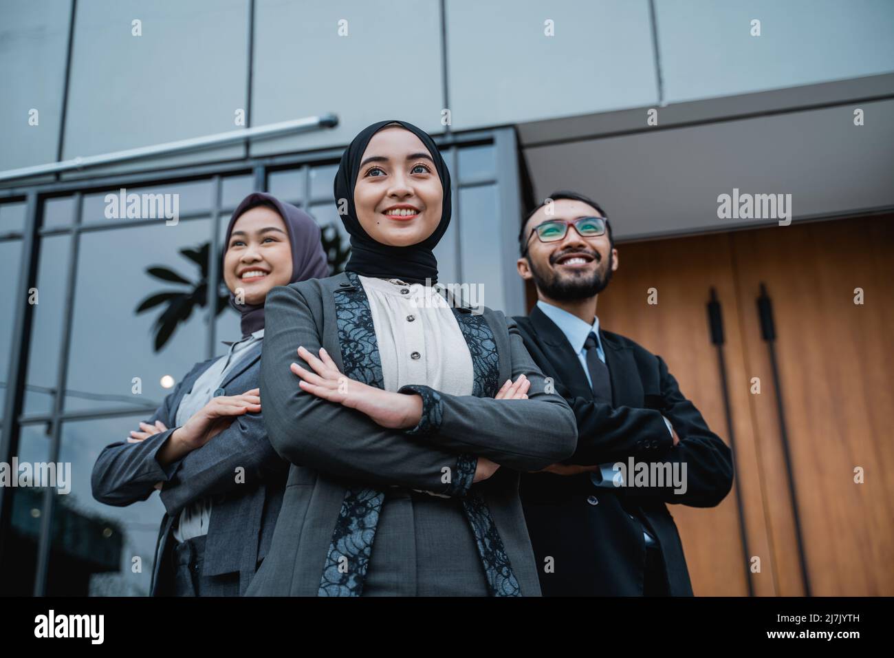 muslim businesswoman leader as she standing in front of her team Stock ...