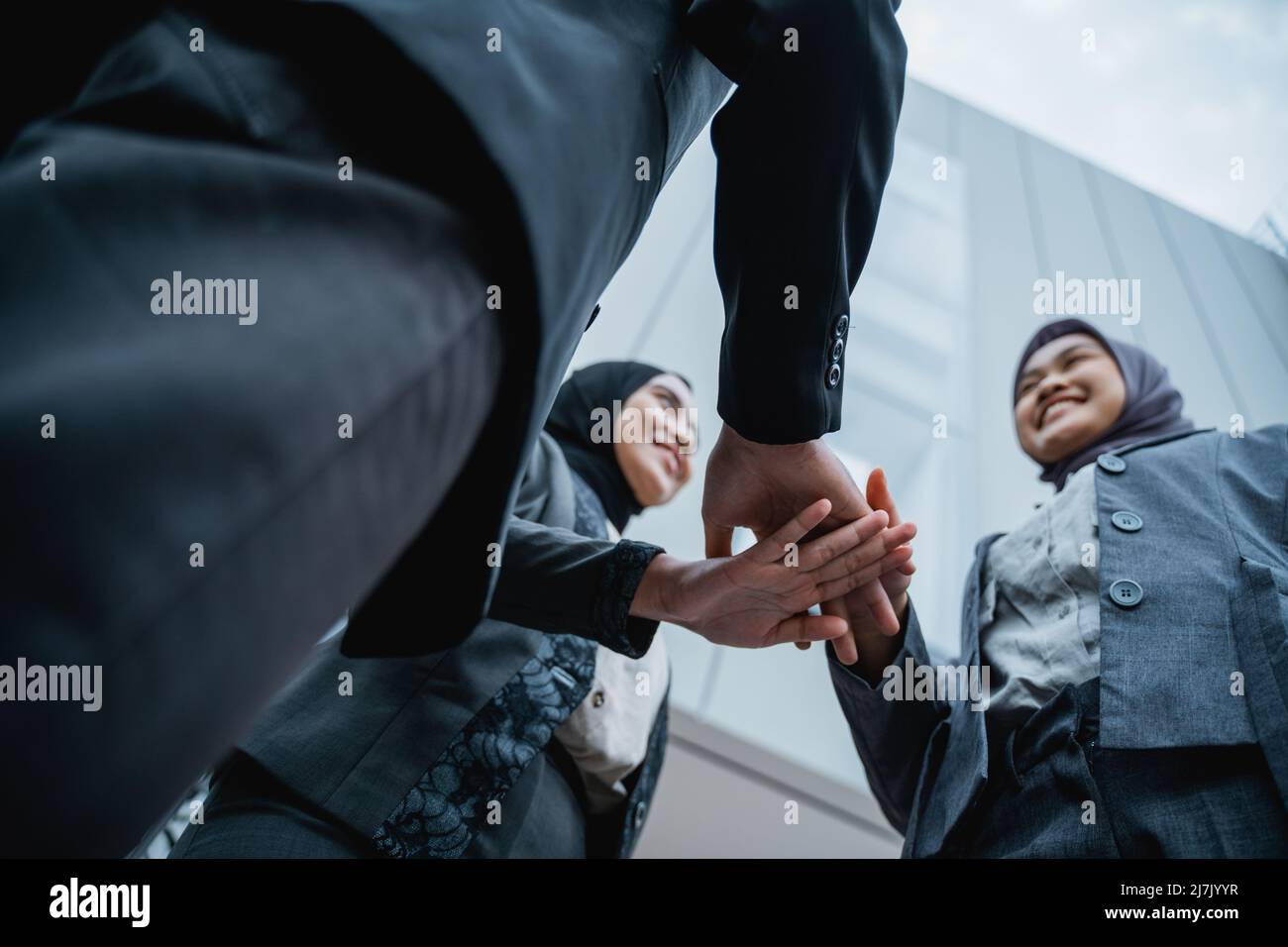 muslim business teamwork Join Hands Support Together showing unity ...