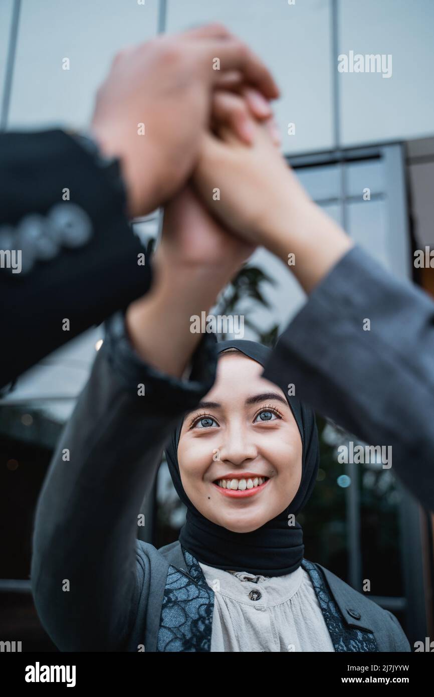 muslim business teamwork Join Hands Support Together showing unity ...