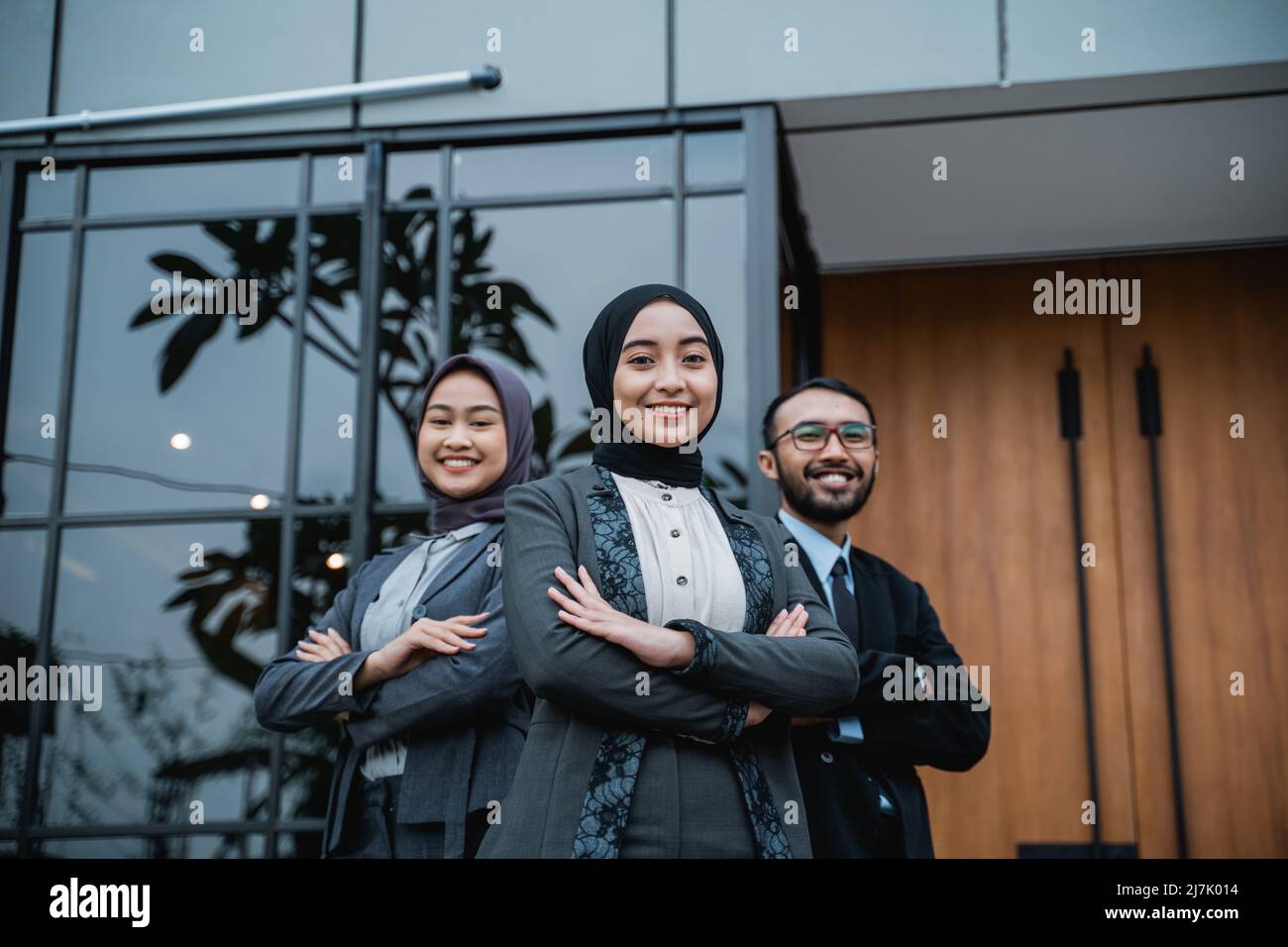 muslim businesswoman leader as she standing in front of her team Stock ...