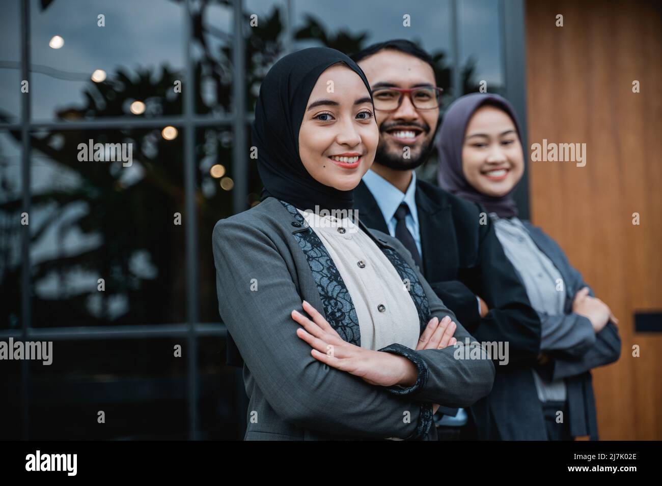 muslim businesswoman leader as she standing in front of her team Stock ...